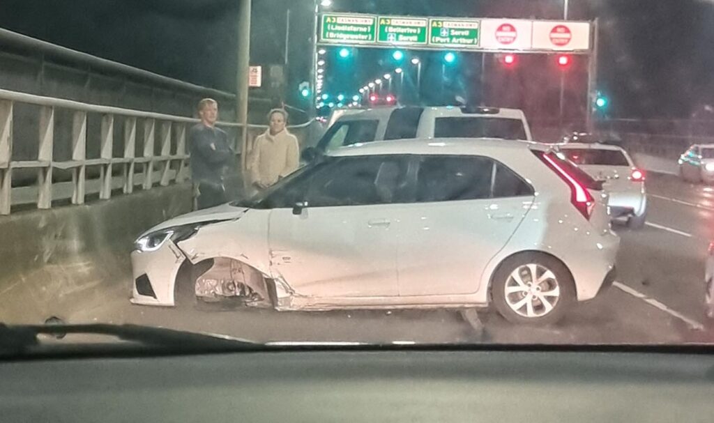 Car loses wheel after crashing into barrier on Tasman Bridge - Pulse ...