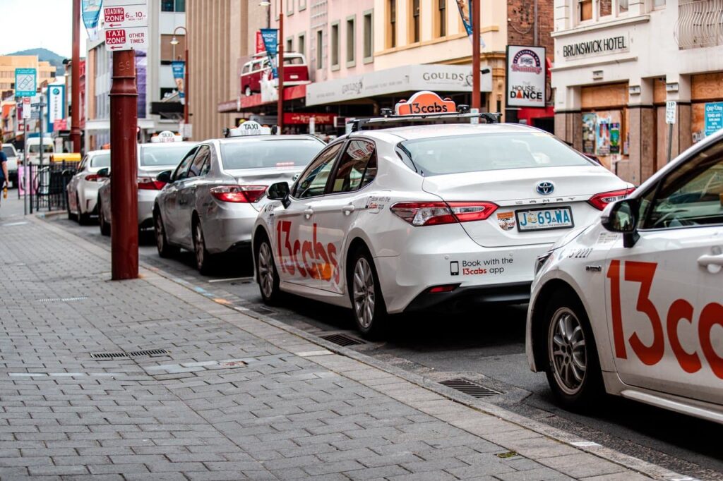 Tasmanian taxi drivers demand compensation as Uber ‘eats into profits ...