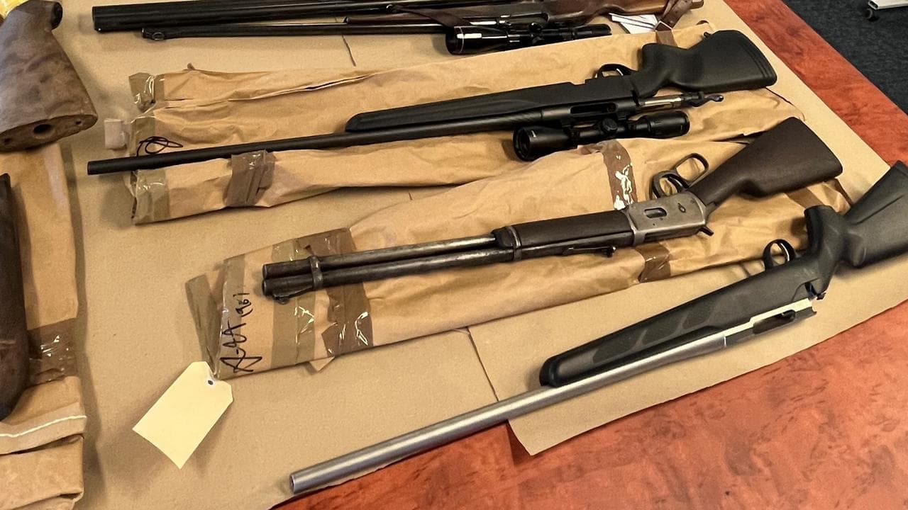 Police find $45,000 cash, drugs and 36 firearms in raids across ...