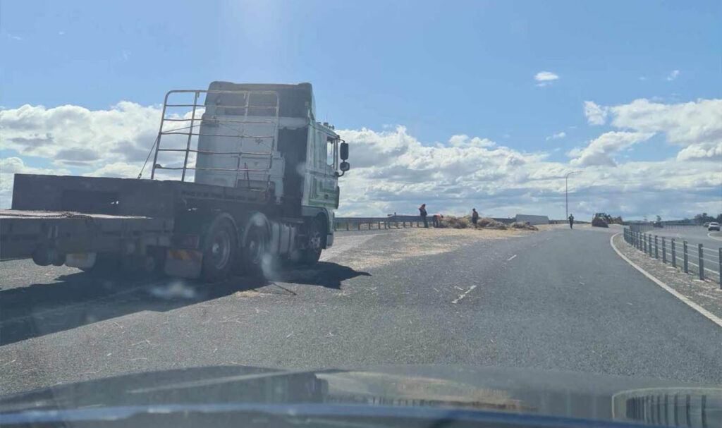 Hay bales go flying on Midland Highway after truck loses its load ...