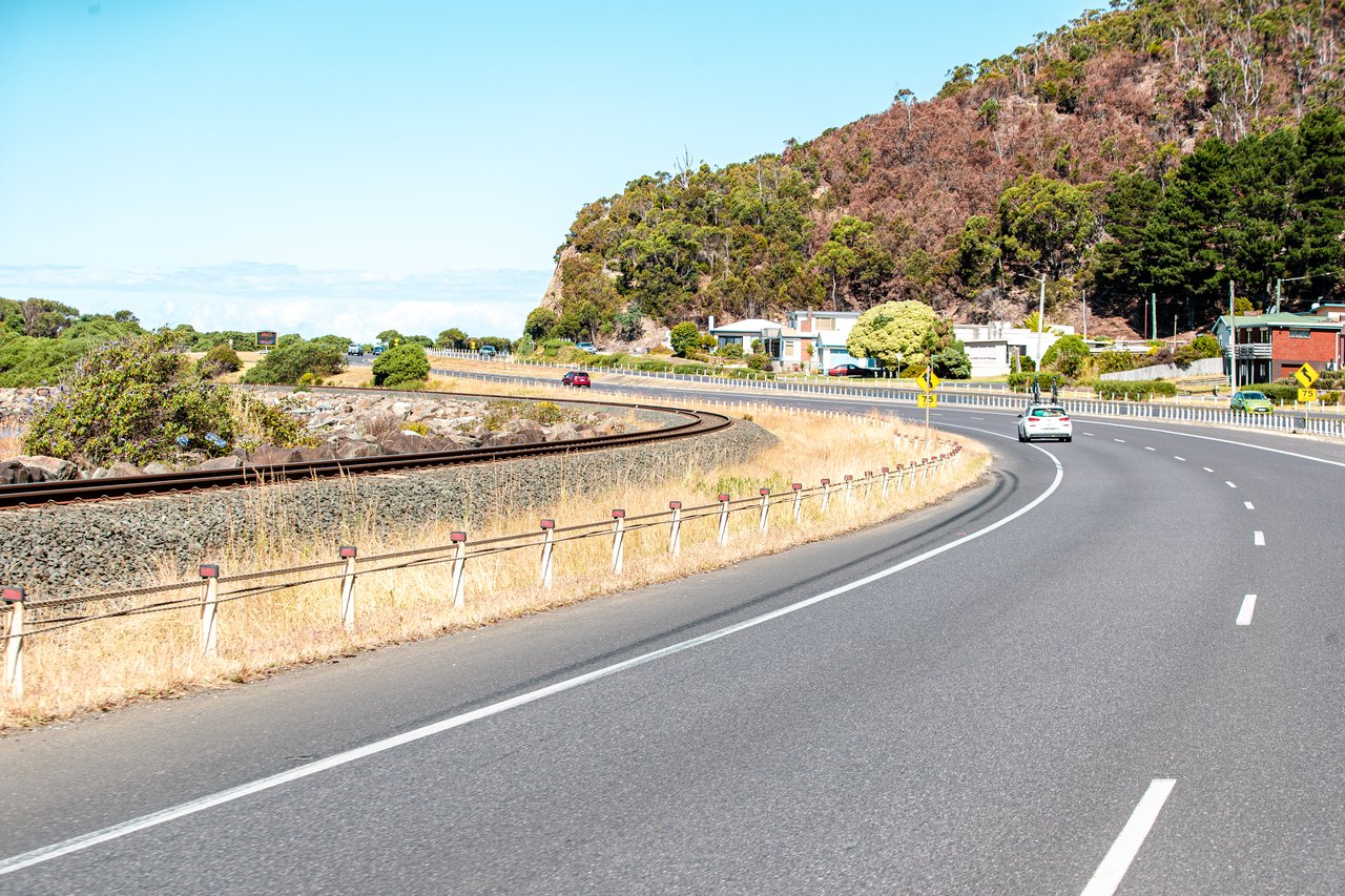 Tasmania Police car rolls on Bass Highway in wet weather - Pulse Tasmania